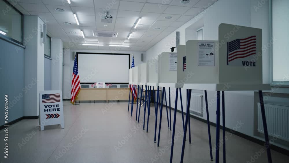 Stockvideo Voting booths with American flag logo in polling station ...