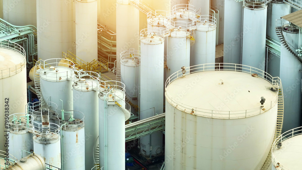 An aerial view drone captures a sprawling lubricant plant with massive ...