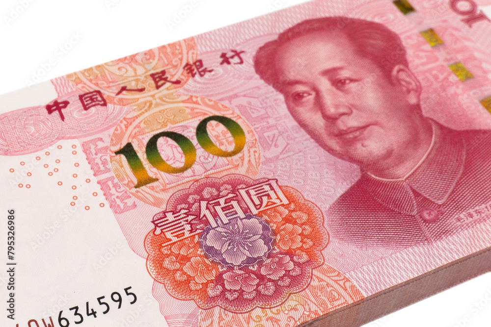 Yuan money isolated on white background. Stack of one hundred yuan bill ...