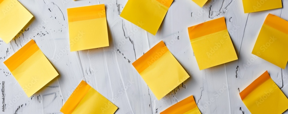Yellow post-it notes on a whiteboard. Stock Photo | Adobe Stock