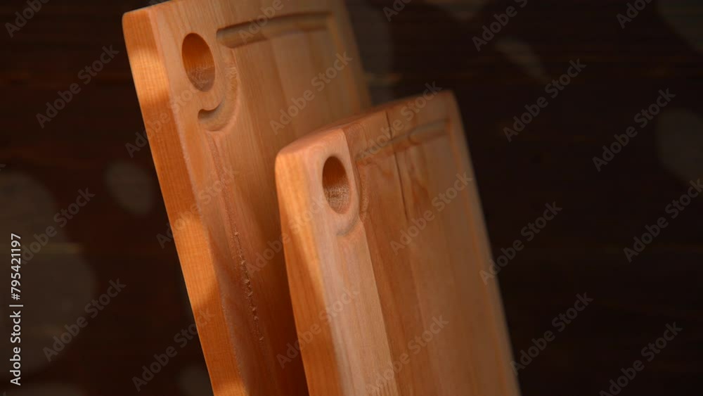 Two wooden cutting boards are showcased next to each other. The cutting ...