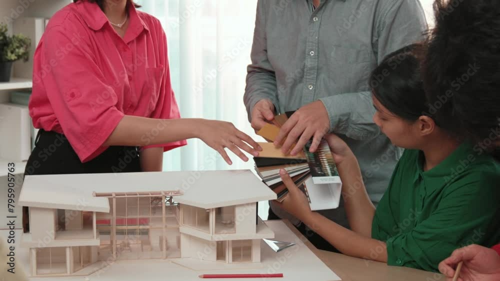 Slow motion home designer using architectural equipment draw a ...