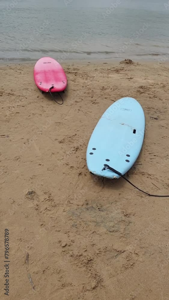two surfboards lying on sand at the beach with space for text Stock ...