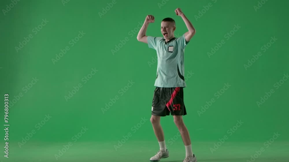 Soccer player on chroma key green screen background. Man professional ...