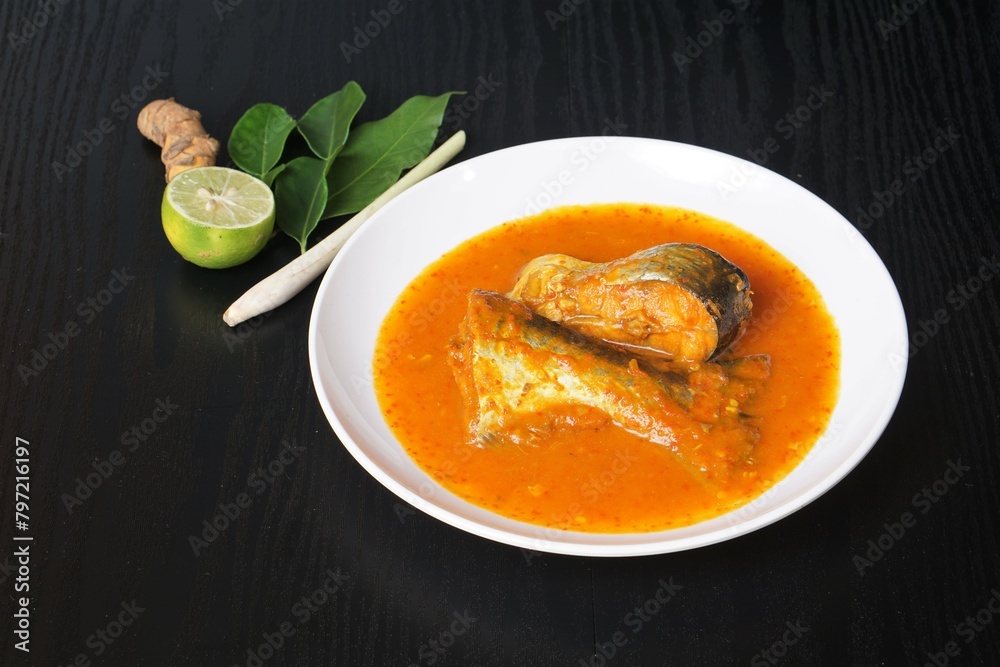 Ikan Patin Masak Tempoyak in a white plate, Ikan Patin Tempoyak is a ...