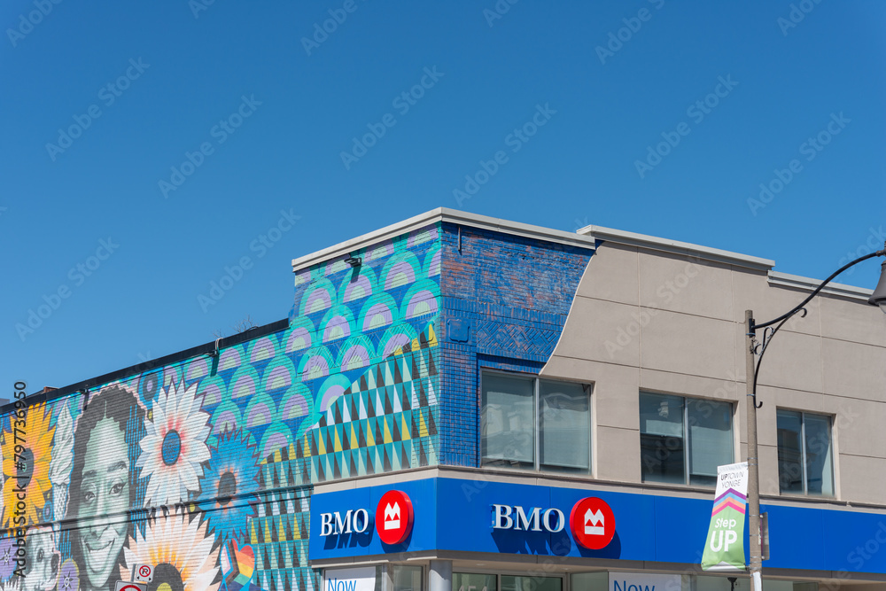 exterior building mural and sign of BMO Bank of Montreal located at ...