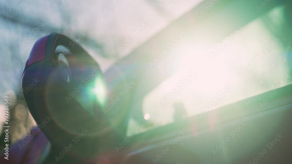 Beautiful anamorphic flare from the sun filtering through a car ...