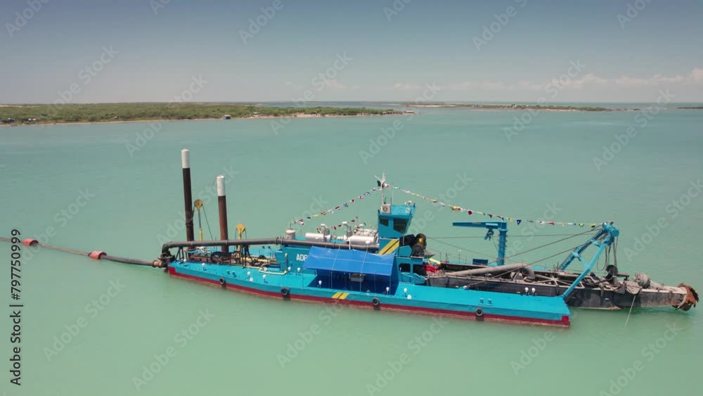 Sand dredging boat in full operation in Matamoros, on the Gulf of ...