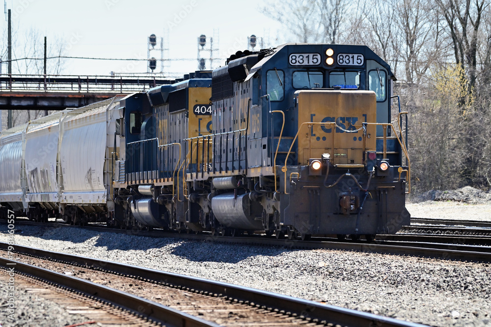 CSX Transportation locomotives lead a freight train through the south ...