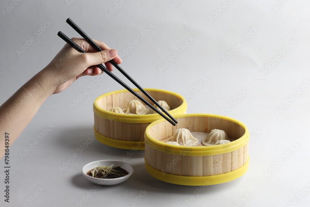 handmade steamed Shanghai Xiao long bao pork meat dumpling soup in bowl ...