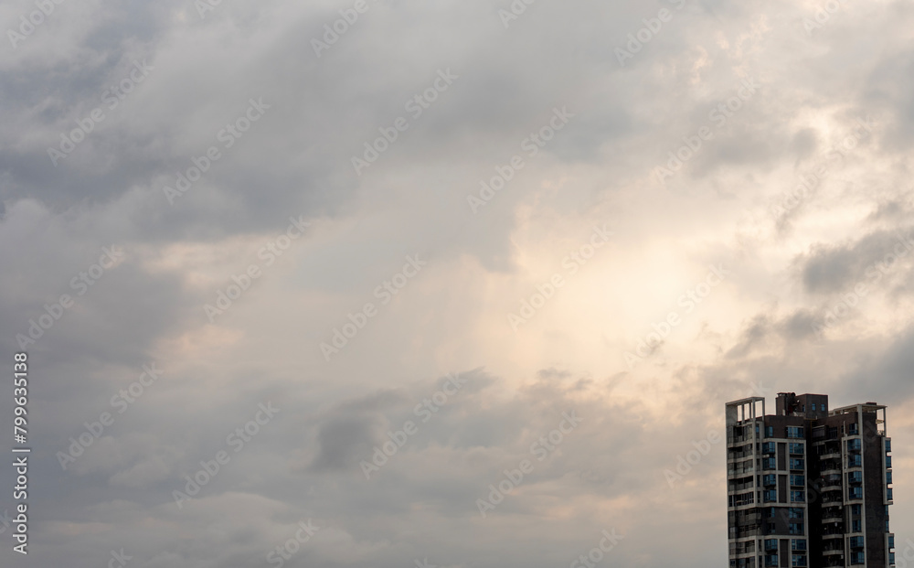 Outside the clouds outside the window, the sun emits sunlight, which is ...