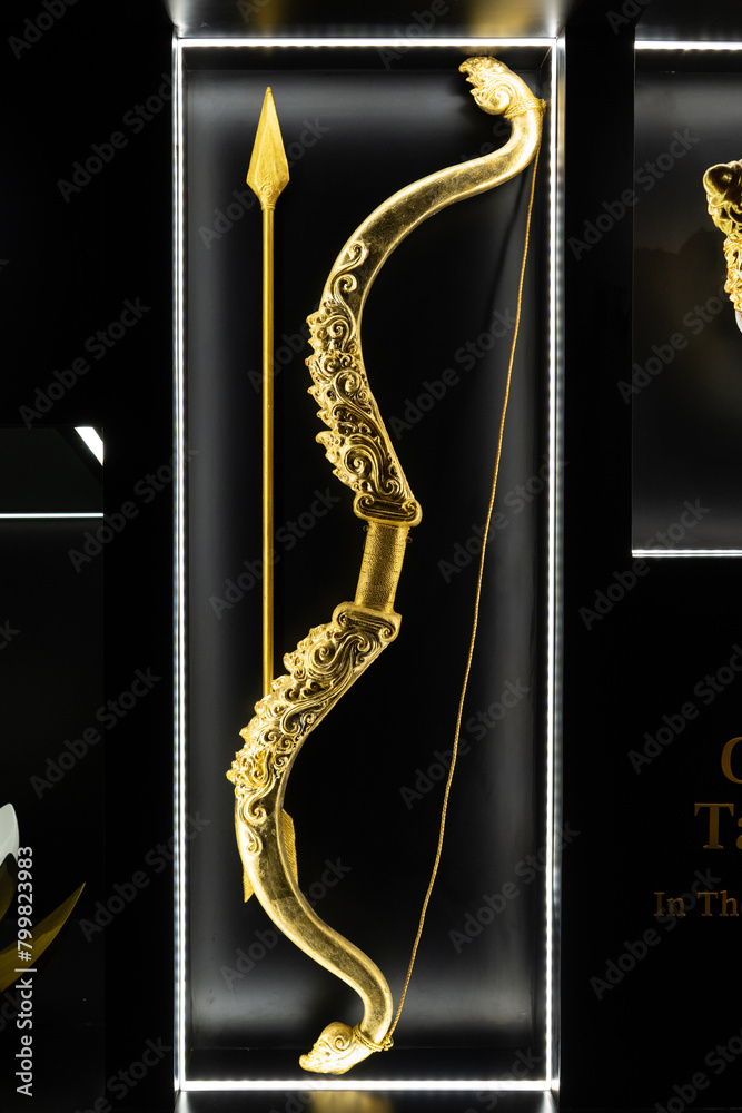 Archer's Heritage An exquisitely crafted golden bow and arrow set ...