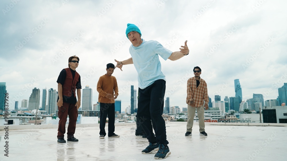 Professional break dance team practice B-boy dance while multicultural ...