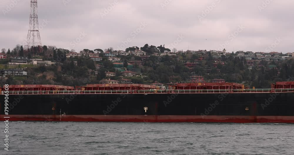 Long ship with cargo sails along river for water transport. Scope of ...