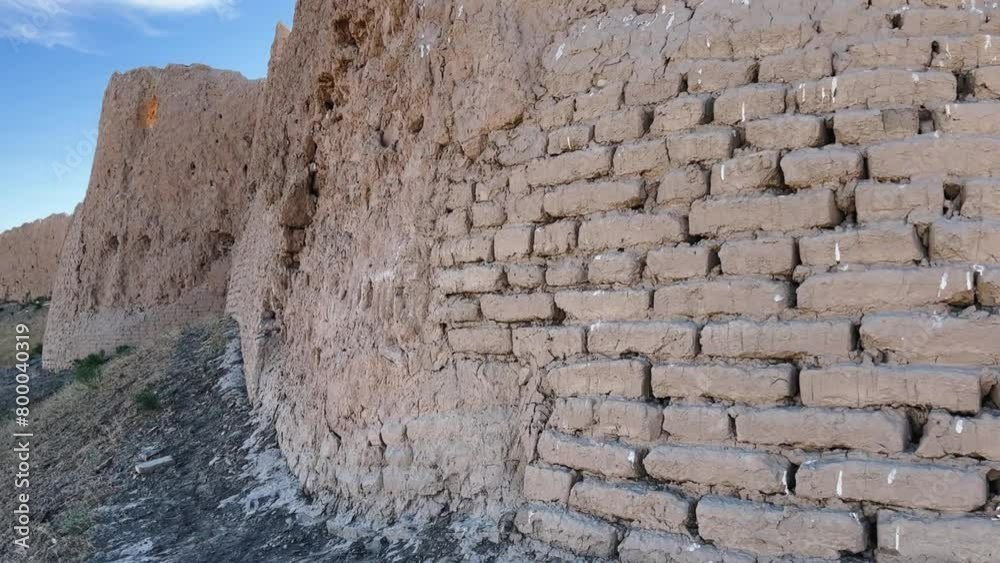Turkestan walls of the ancient city of Sauran on a sunny day with a ...