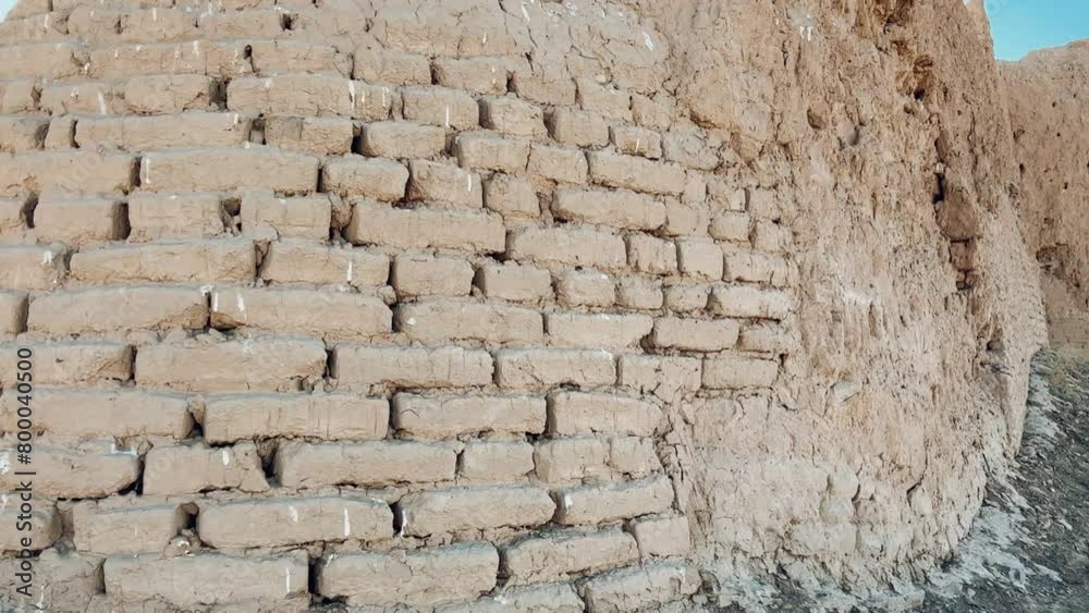 Turkestan walls of the ancient city of Sauran on a sunny day with a ...