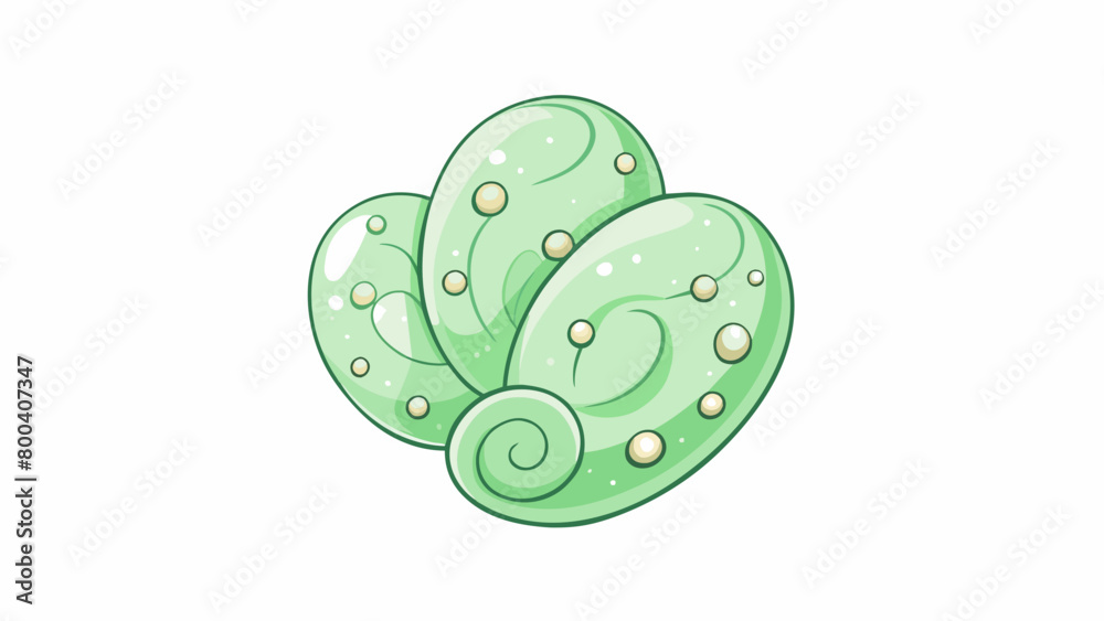 Delicate pale green seeds with a subtle swirling pattern etched into ...