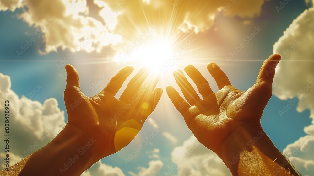 Hands to heaven, person with hand up looking at the skies Stock Photo ...
