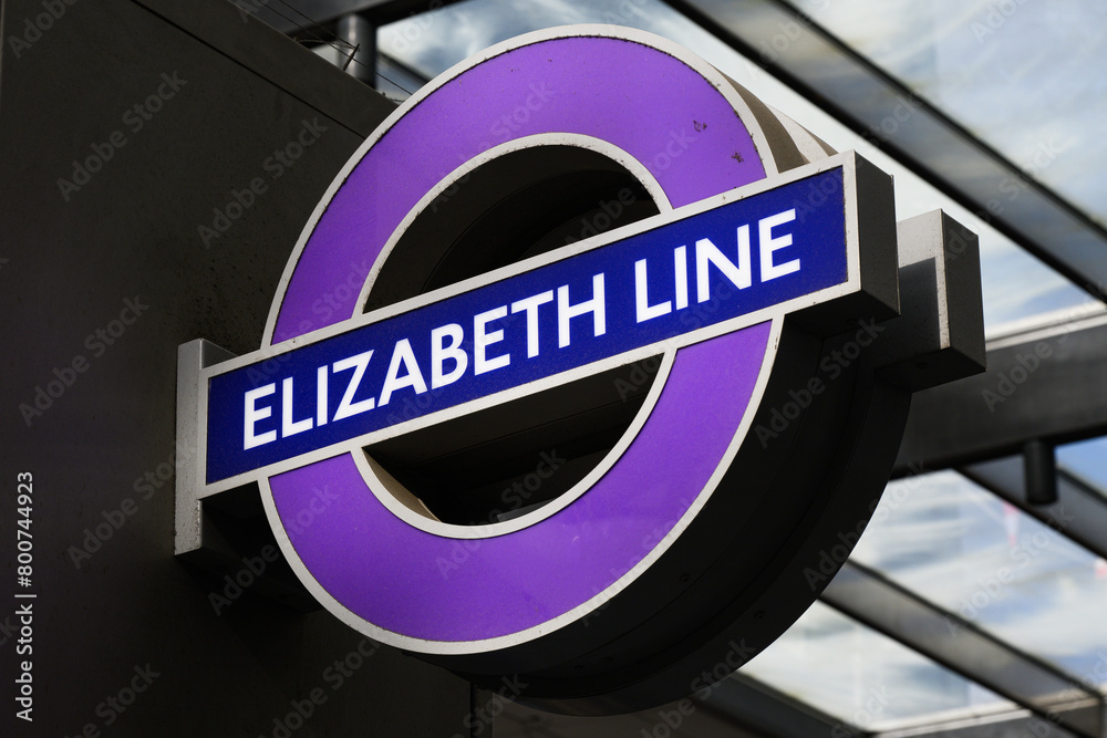 London, UK - March 23, 2024 - Purple Elizabeth Line roundel in closeup ...