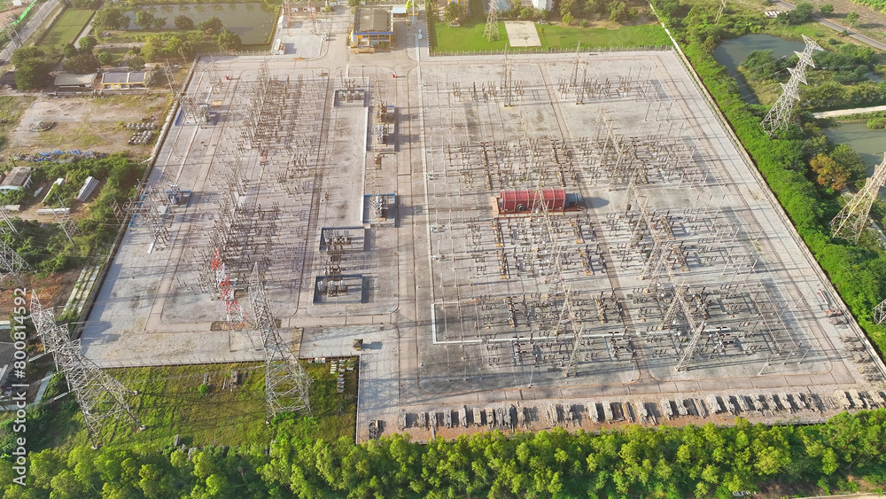 From a bird's-eye perspective, an electrical substation forms a ...