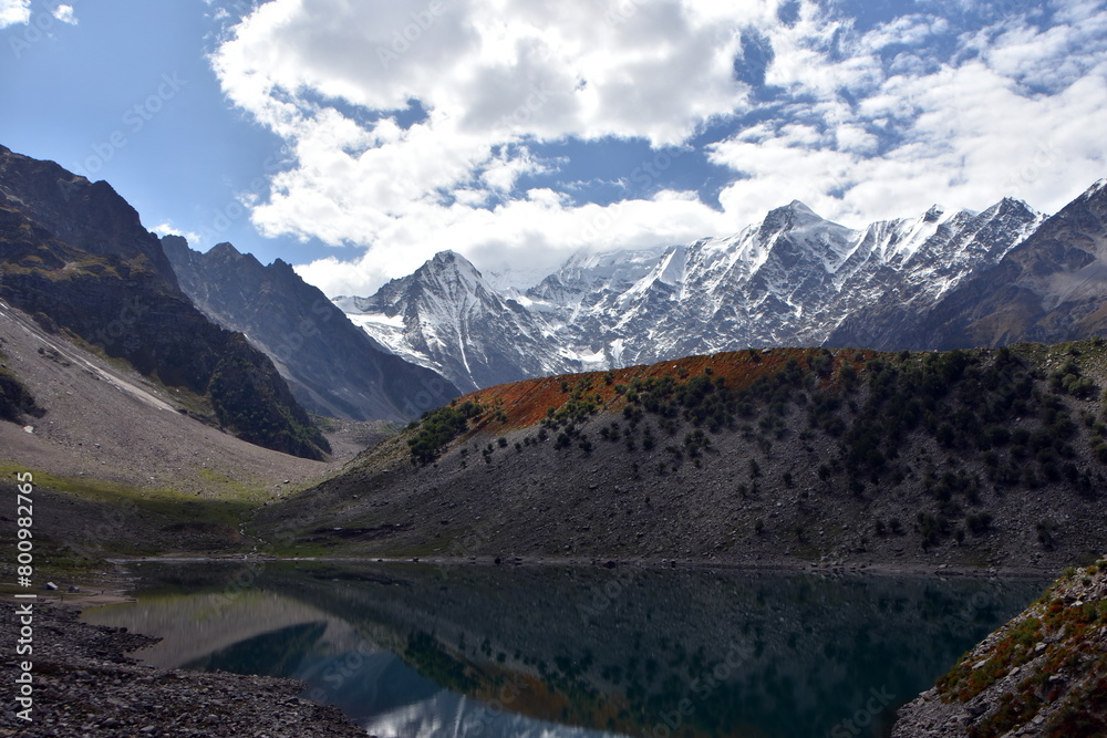 Marvelous landscape consisting of a lake and mountains with legendary ...