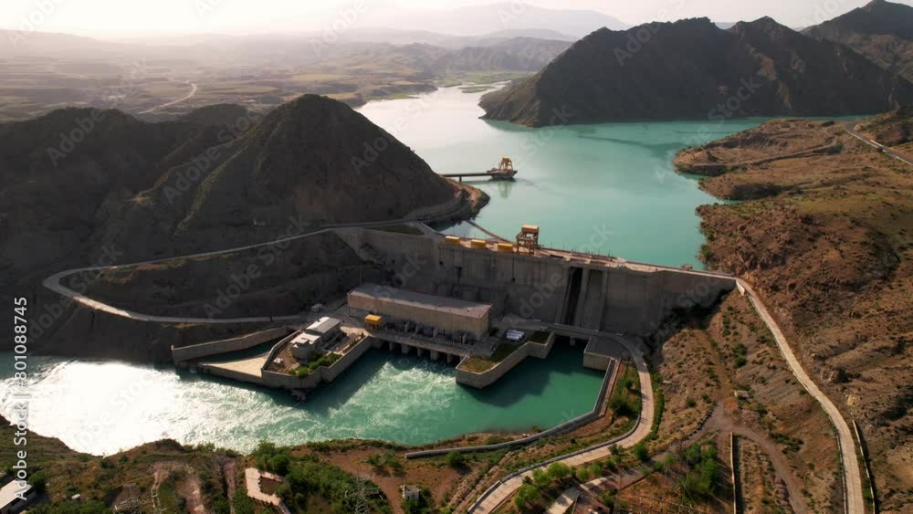 Dam and water reservoir. Panoramic aerial view of the gravity dam and ...