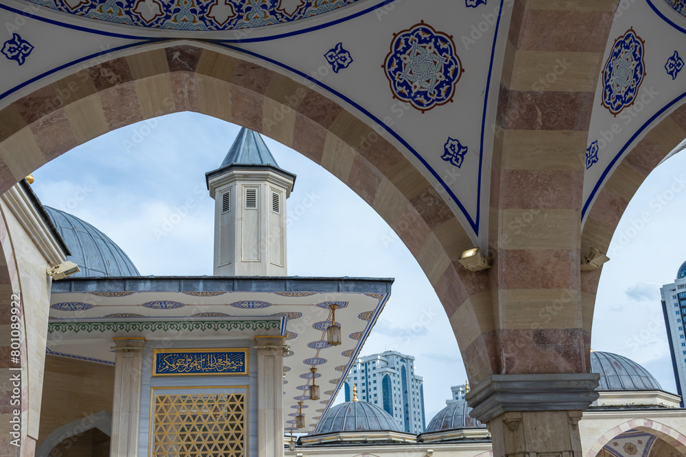 The traditional Chechen ornament "bustam" on the arches of the summer ...