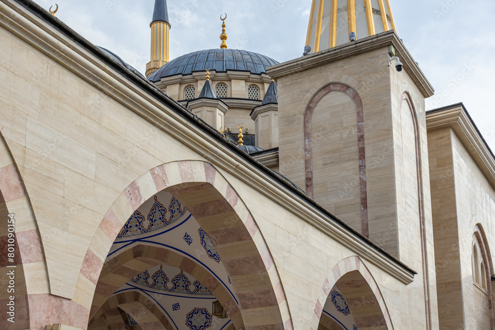 The traditional Chechen ornament "bustam" on the arches of the summer ...