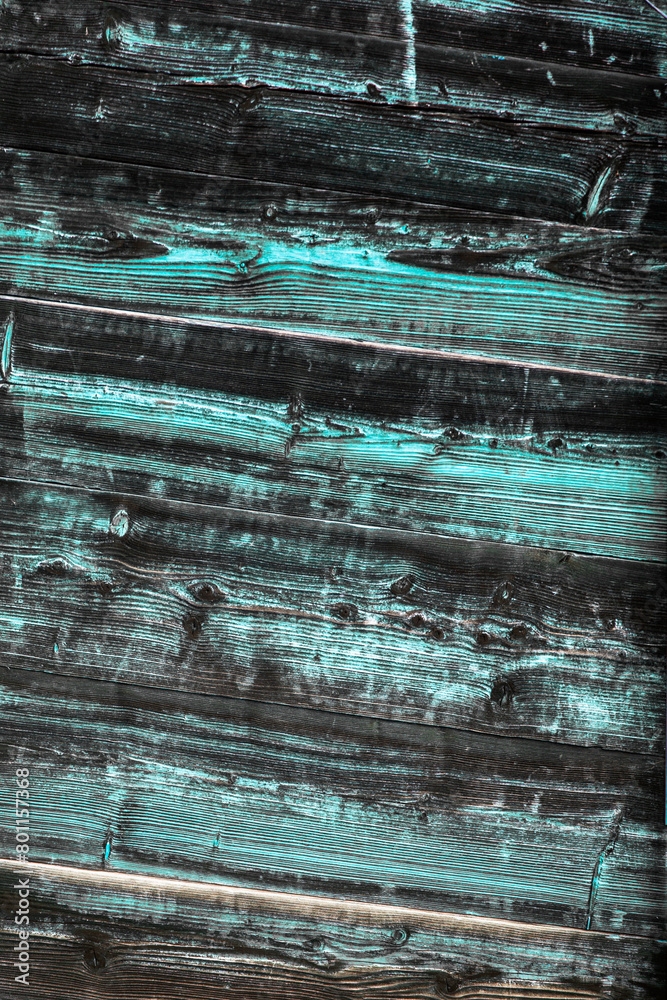 Fragment of the cladding of an old house made of boards. Diagonal ...