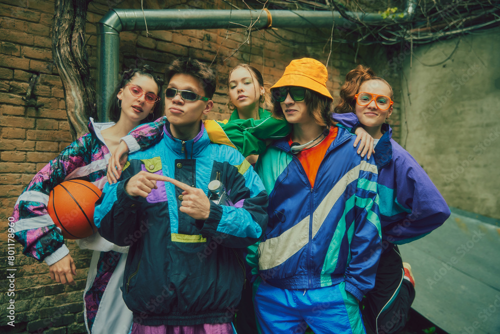 Youthful spirit of street fashion. Stylish young people, boys and girls ...