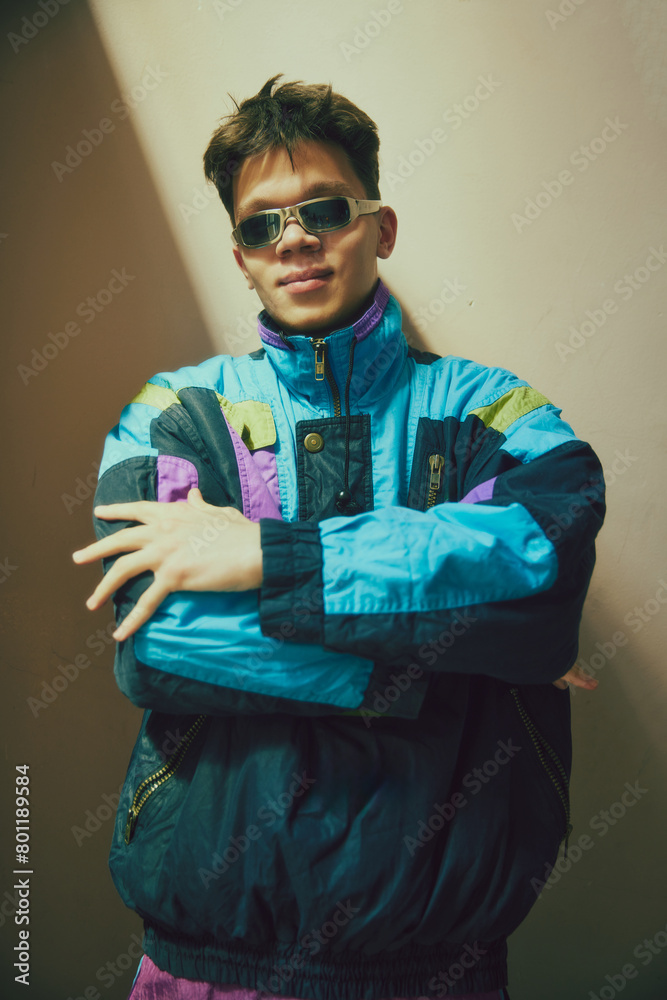Young boy wearing classic 90s jacket in shades of blue, stylish ...