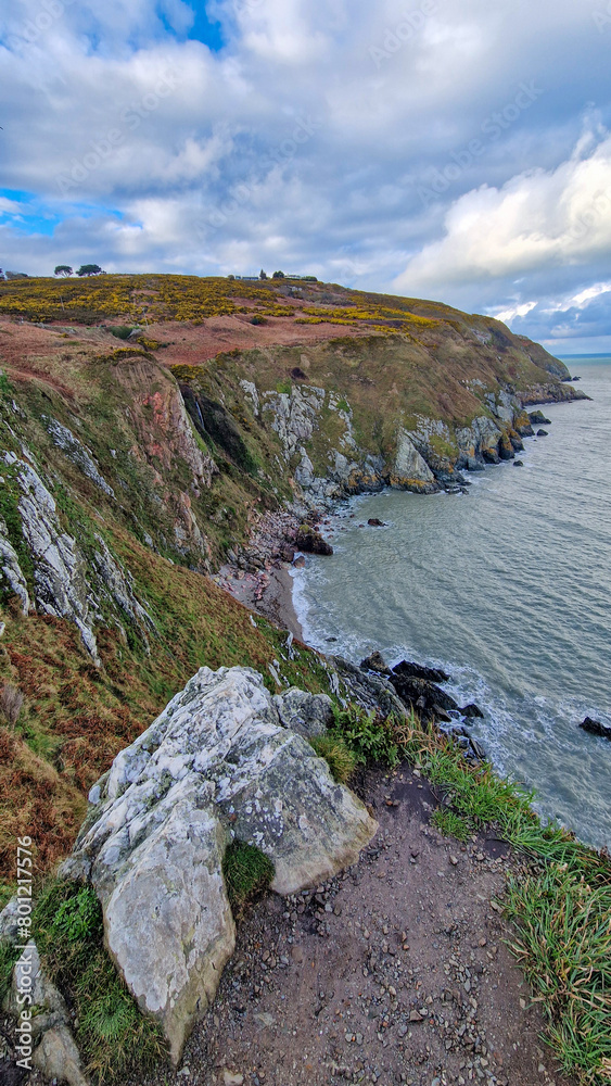 From the heights of Howth, Dublin Bay extends its azure arms, offering ...