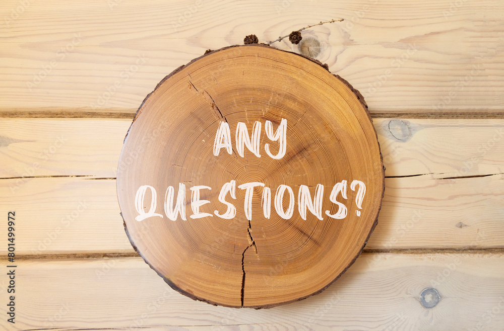 Any questions symbol. Concept words Any questions on beautiful wooden ...
