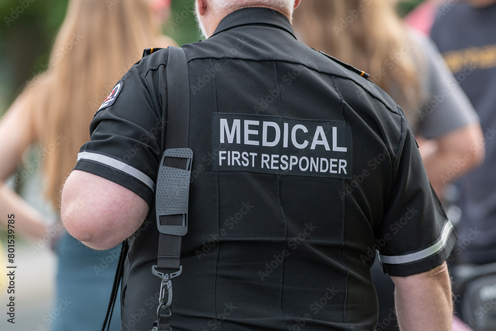 A close-up of a Caucasian male emergency health medical first responder ...