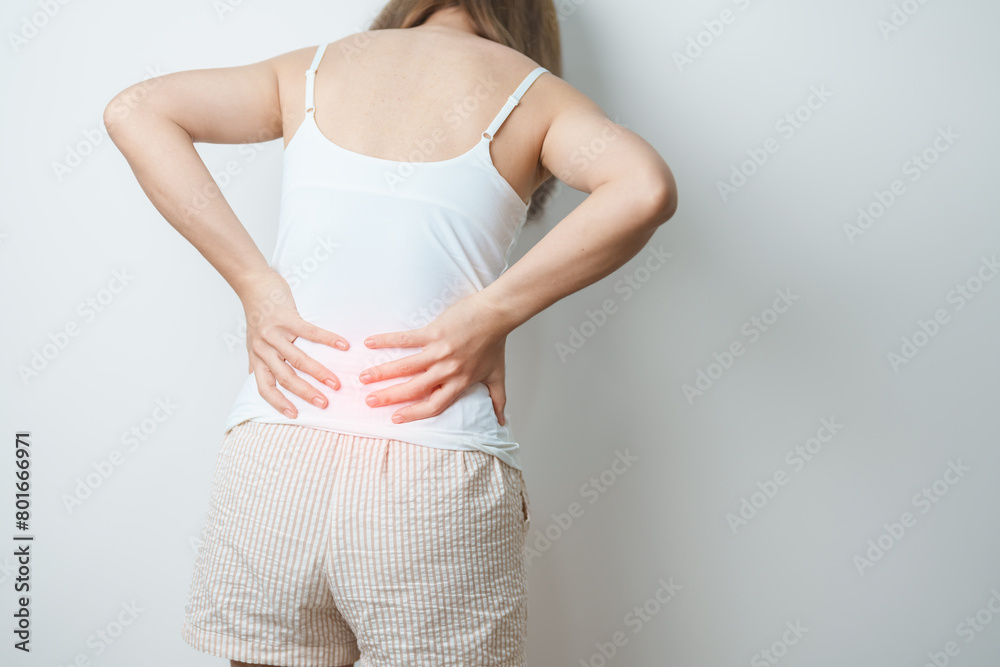 woman having back body ache during at home. adult female with muscle ...