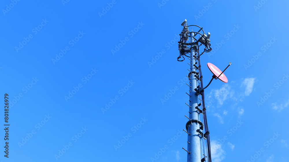 4G and 5G cell monopole. Satellite dish on cell tower with antenna for ...