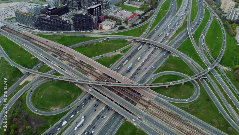 Busy urban junctions teem with cars, drone hovers over impressive ...