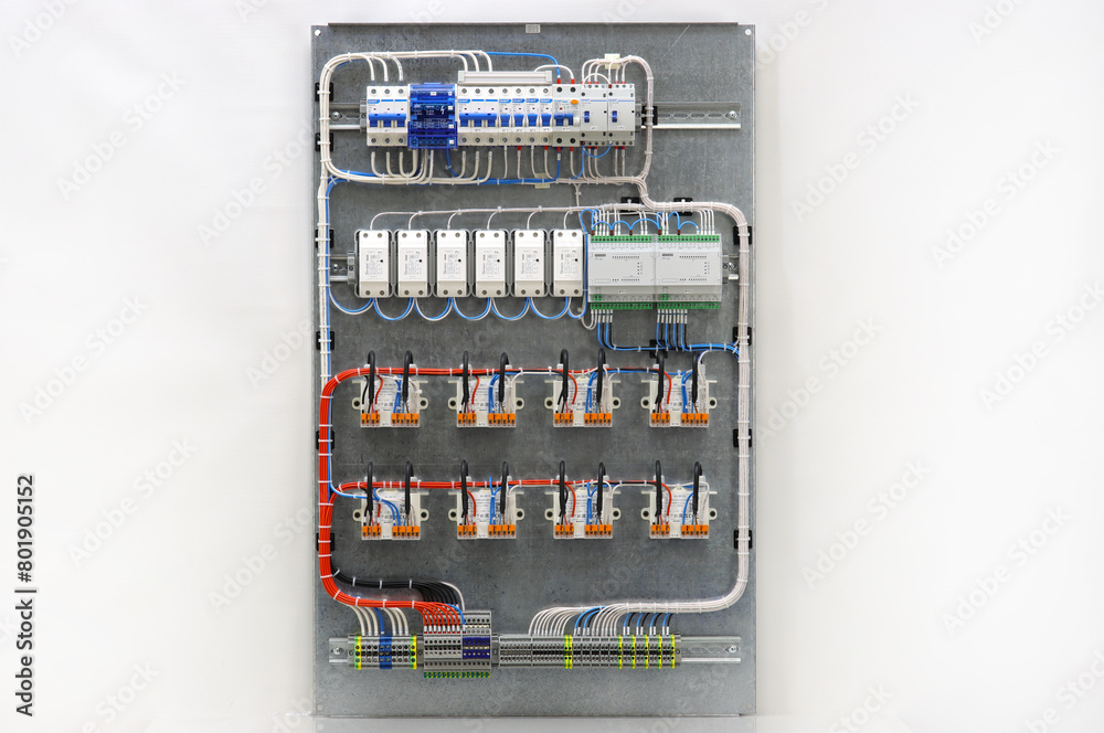 An electric switchboard with modules for protection and control of ...