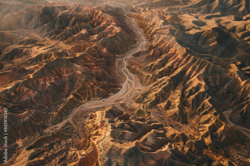 An aerial view of a dried-up riverbed after being washed away by the ...