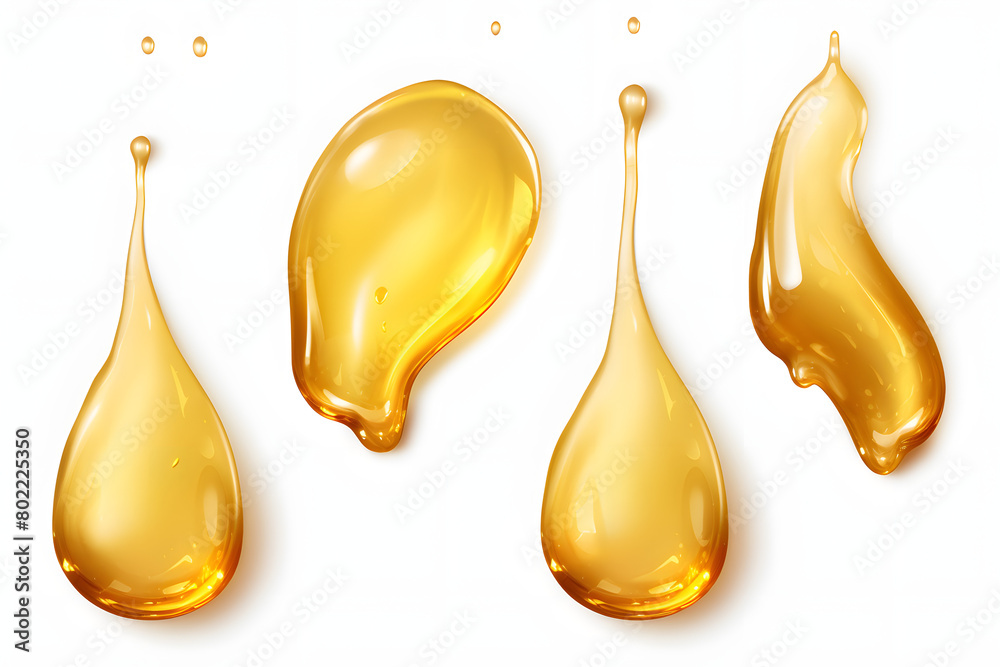 Assortment of thick, amber-colored maple syrup drops, viscous and ...