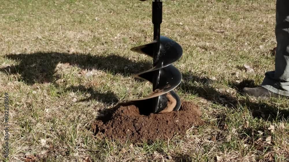 Vidéo Stock Drilling the ground with rig machine. The man drills the ...