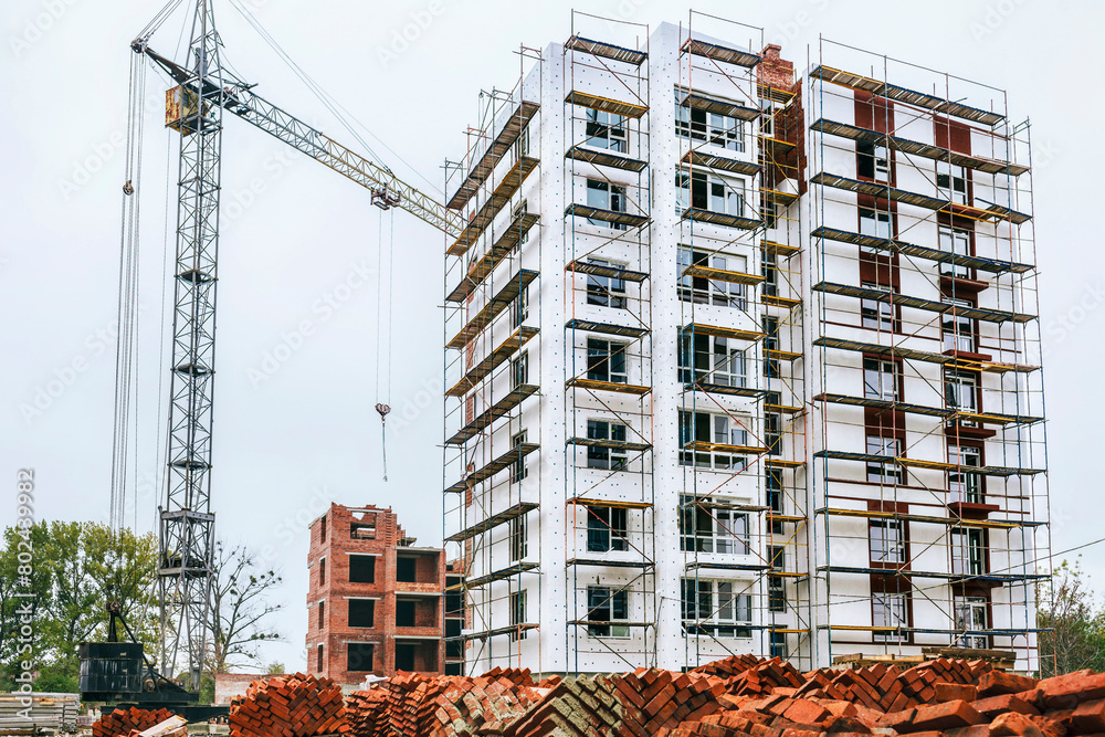 Polystyrene Insulation of Modern High rise Building under Construction ...