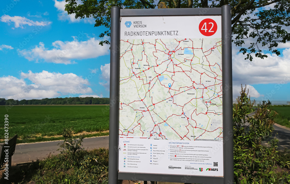 Kempen, Germany - May 1. 2024: German bike hub with map and direction ...