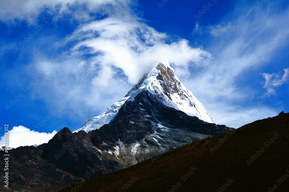 Artesonraju (6025 m) - a pyramidal mountain peak located near the city ...