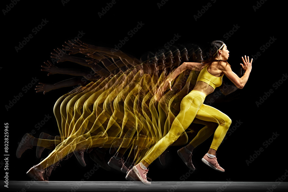 Concentrated and focused young woman, athlete in motion, running ...