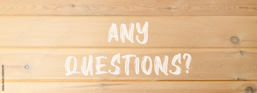 Any questions symbol. Concept words Any questions on beautiful wooden ...