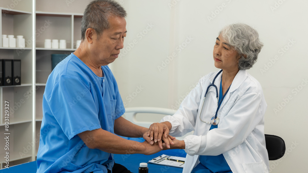 Senior Asian female doctor examining patient's health, basic procedures ...