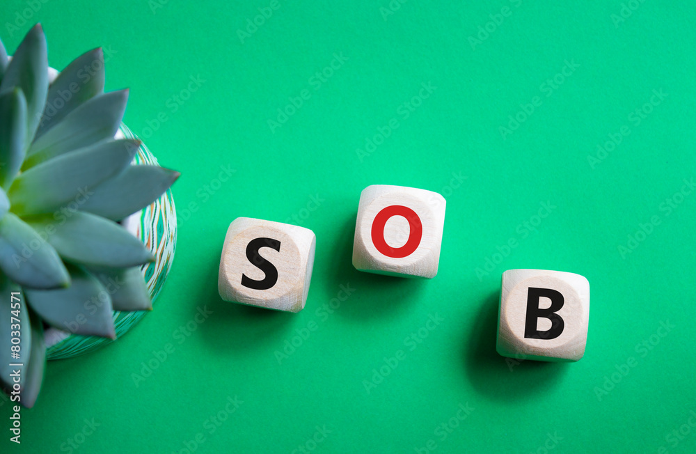 SOB - Shortness of breath symbol. Wooden cubes with words SOB ...