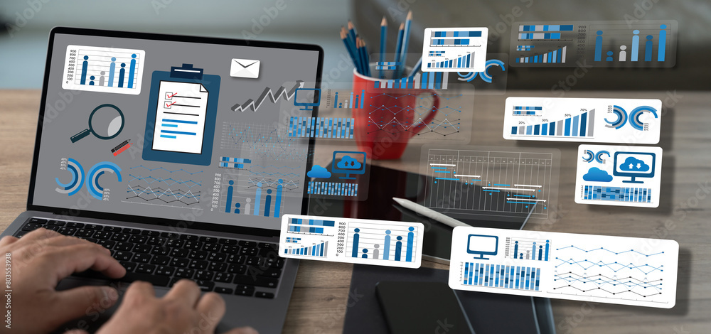 Using a computer, an analysis businessman Working at a home office ...