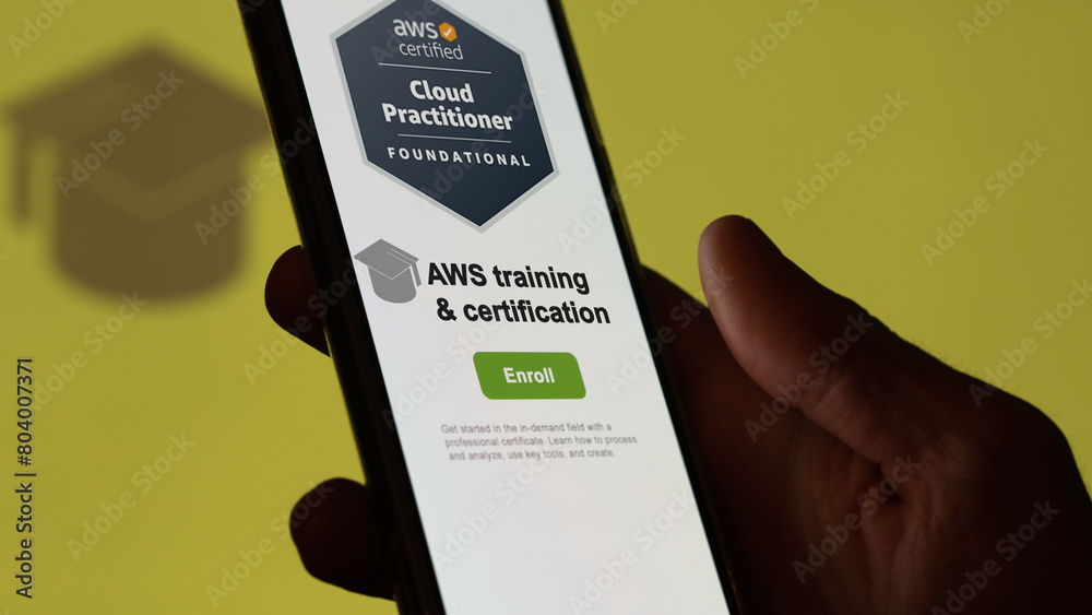 May 3th 2024. Student enrolls to aws certification program on a phone ...